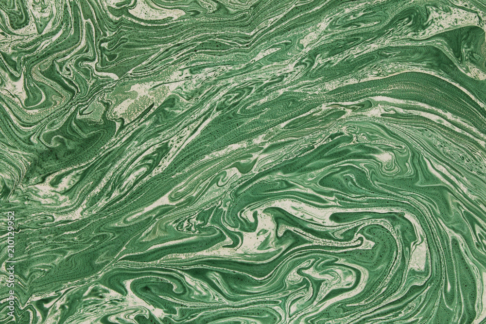 Abstract blurred green background with elements of spreading green ...