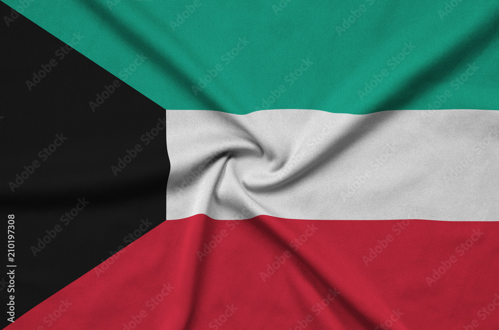 Kuwait flag is depicted on a sports cloth fabric with many folds. Sport ...