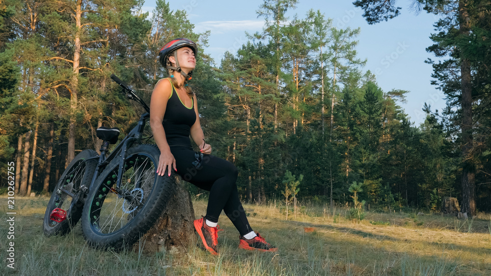 Fat bike also called fatbike or fat-tire bike in summer riding in the ...