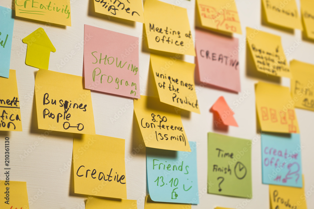 Working wall in the office with stickers Post-it for brainstorming and ...