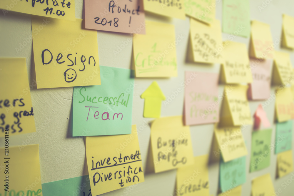 Paper stickers on the visualization board. The concept of team business ...