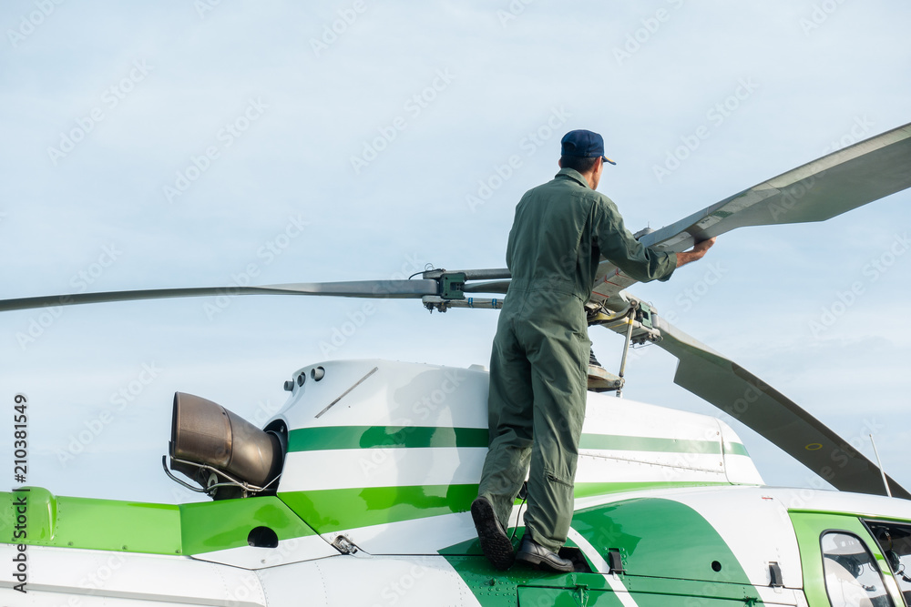 Pilot Check befor flight a helicopter Engine Stock Photo | Adobe Stock