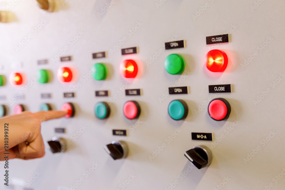 Engineer working on checking and maintenance electrical equipment ...