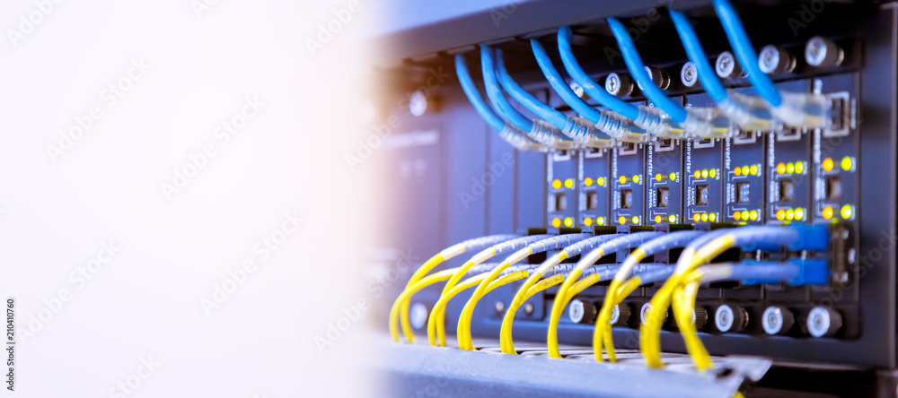 Network panels, switches, and cables in data centers Stock Photo ...