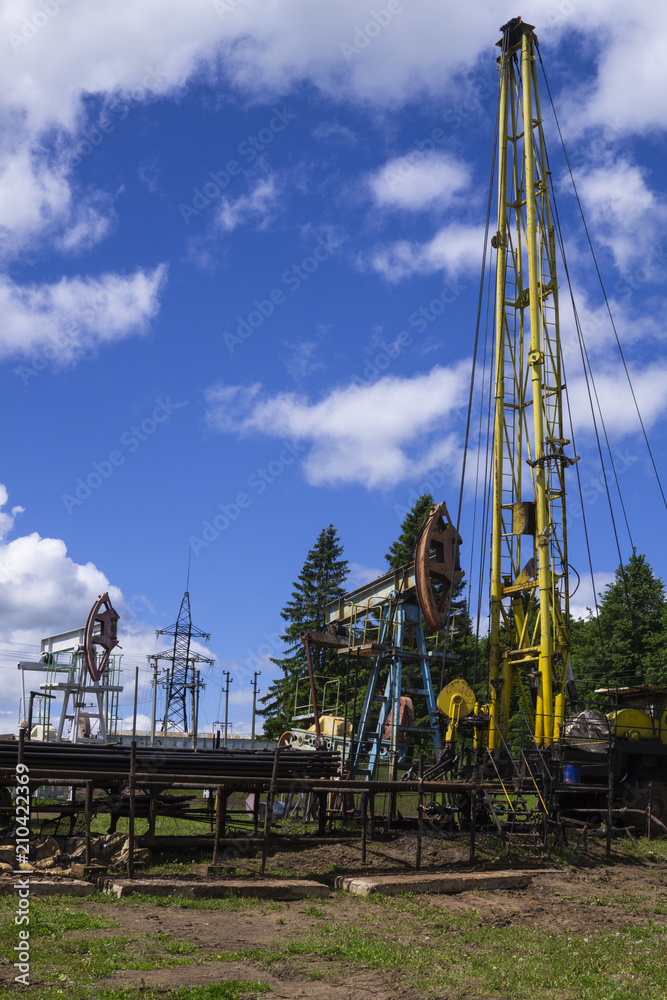 The pumping units and well workover operation. Oil Pump Jack (Sucker ...