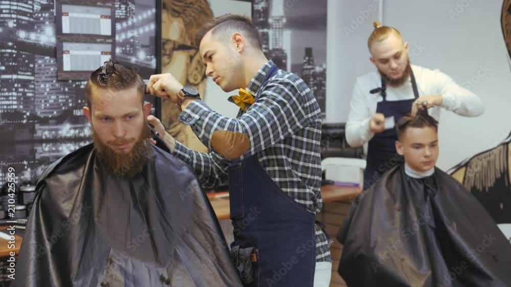 Hairdresser for men. Barbershop. Hair care for a young guy. Hairdresser ...