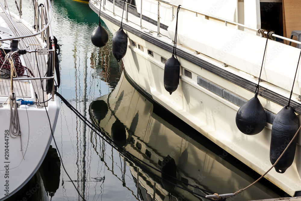 Yacht reflection north dock boat seaport sky blue sea background sunset ...