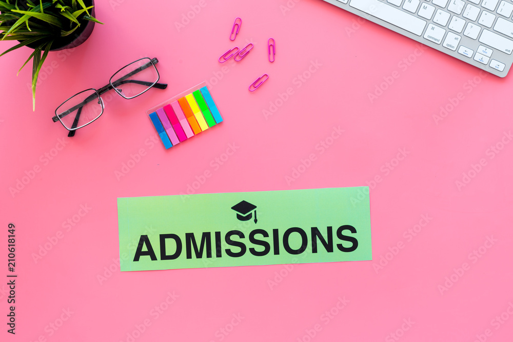 College admission concept. Word admissions with graduation cap sign on ...