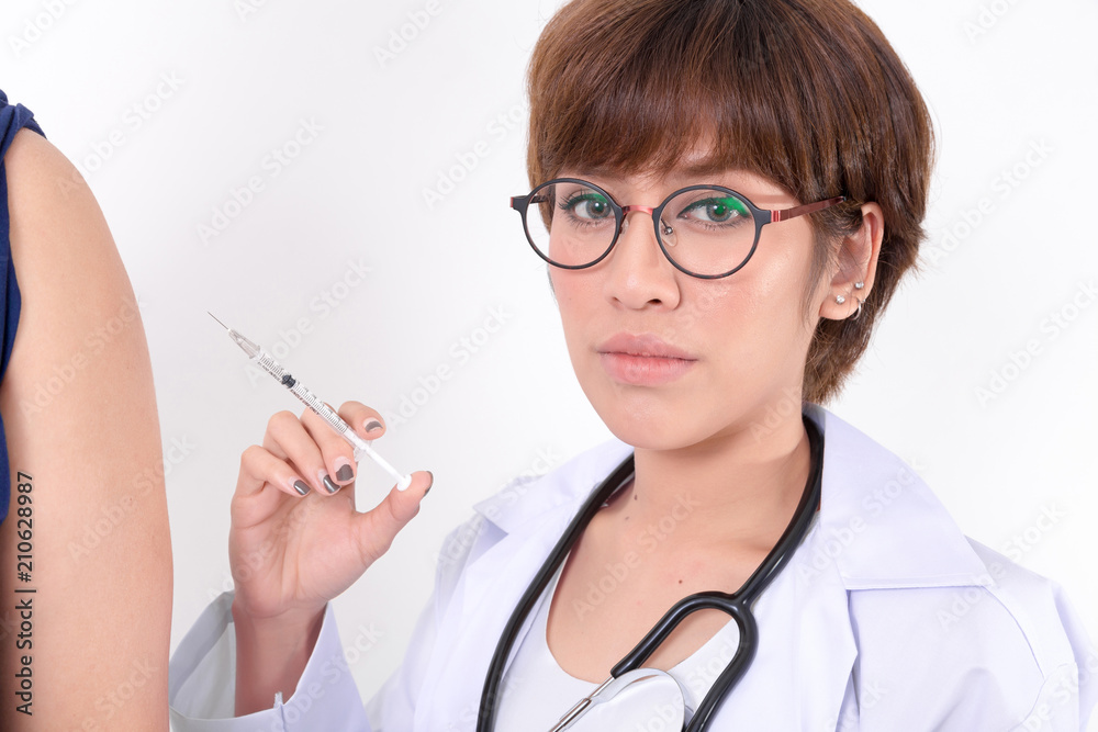 Doctor with syringe in hand. medical health professional holding a ...