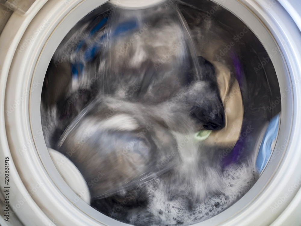 Top loading washing machine washes laundry. Internal view of a washing ...