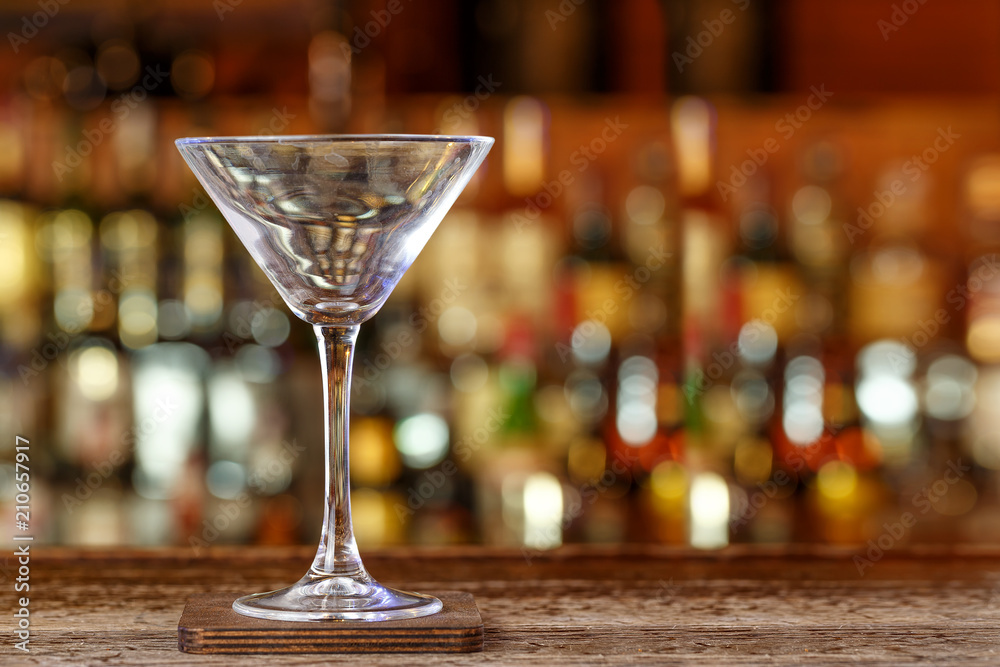 Cocktail glass on the background of the bar Stock Photo | Adobe Stock
