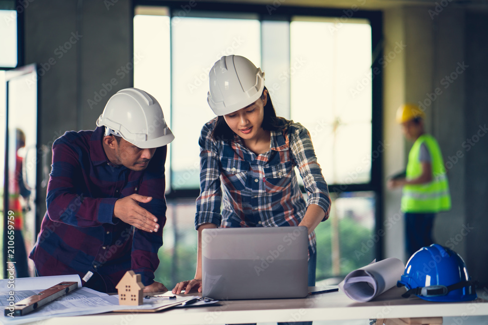 Architect & Engineer working drawing document about project planning ...