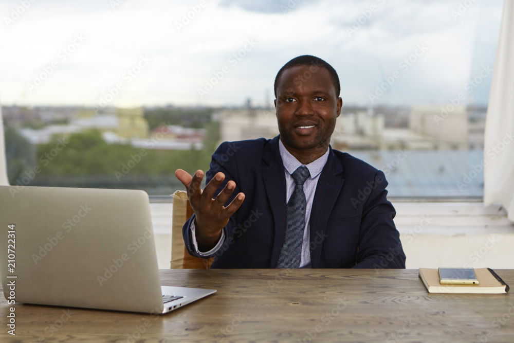 Portrait of positive Afro American male human resource manager in ...