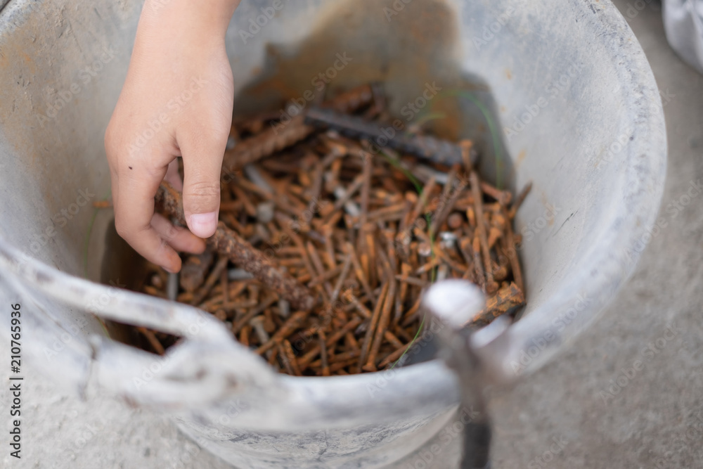 Close up of hand little girl labor working in commercial building ...