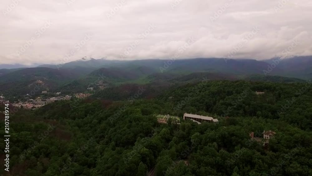Compilation of four aerial drone shots of Gatlinburg, Tennessee. Two ...