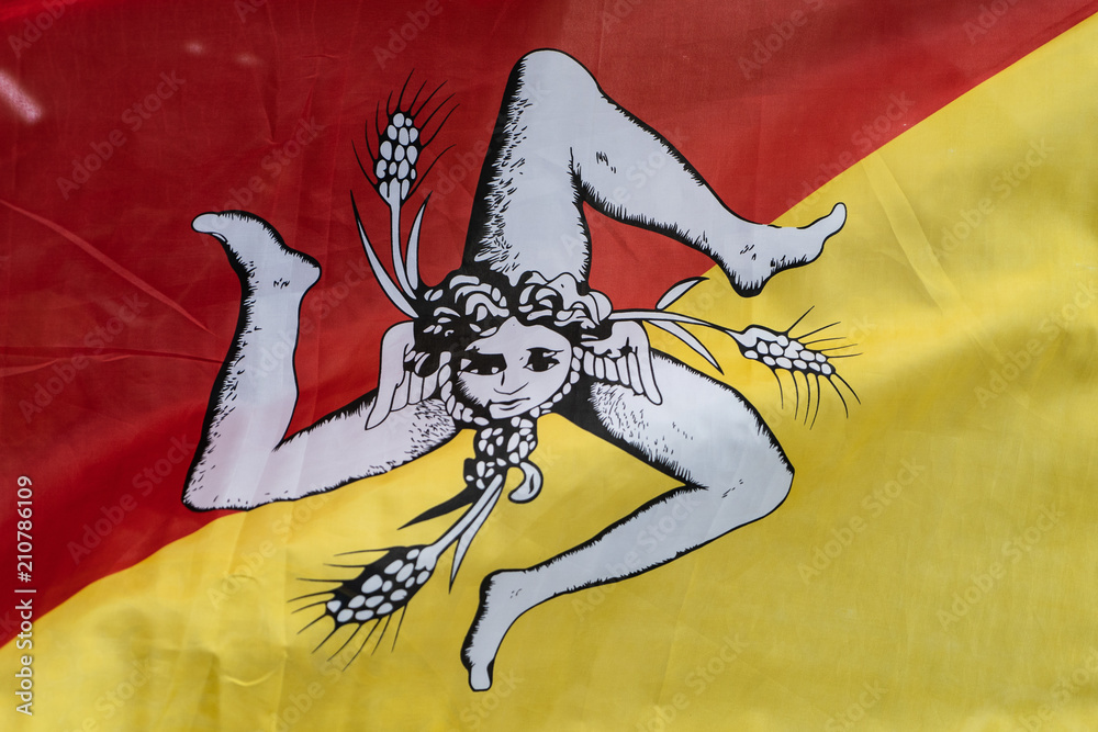 The sicilian flag with the "trinacria", main symbol of the island Stock ...