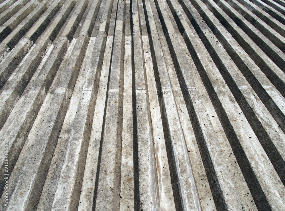cast concrete with vertical ribbed texture with a converging view in ...