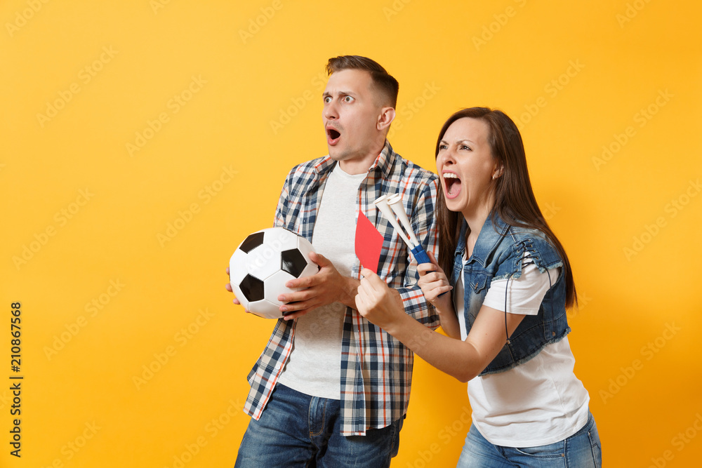 Young angry expessive couple, woman man football fans cheer up support ...