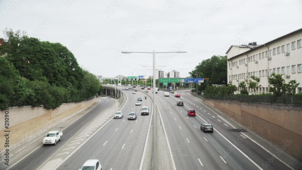 View from bridge over the highway E4 in Stockholm, Sweden. Cars, trucks ...
