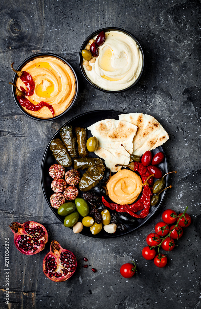 Arabic traditional cuisine. Middle Eastern meze platter with pita ...