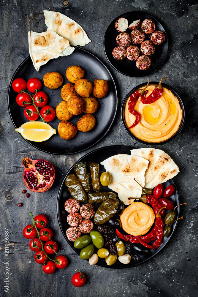 Arabic traditional cuisine. Middle Eastern meze platter with pita ...