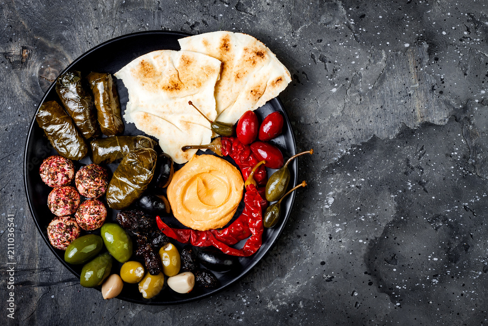 Arabic traditional cuisine. Middle Eastern meze platter with pita ...