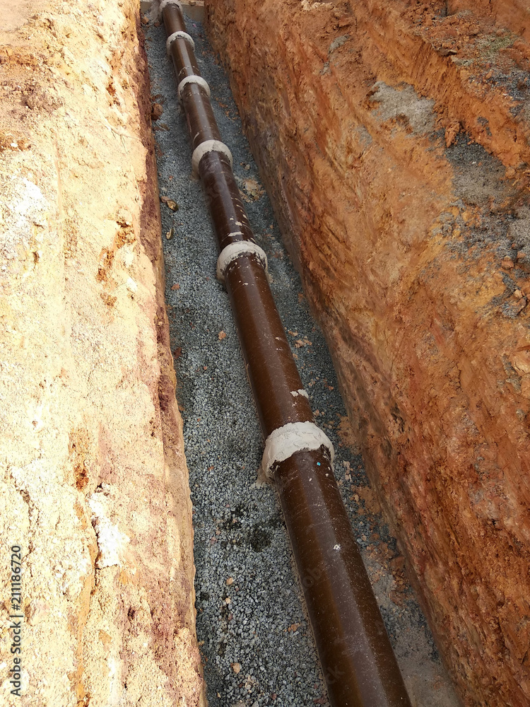 Sewerage manhole and pipes line under construction at the construction ...