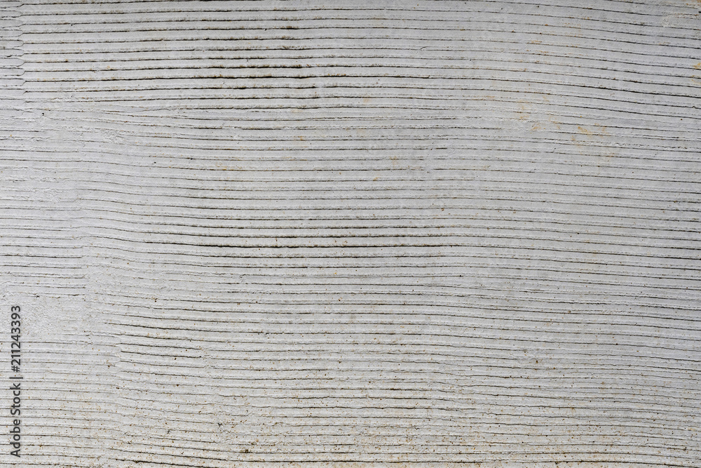 Preparation of new cement wall prepared for tiling in construction site ...