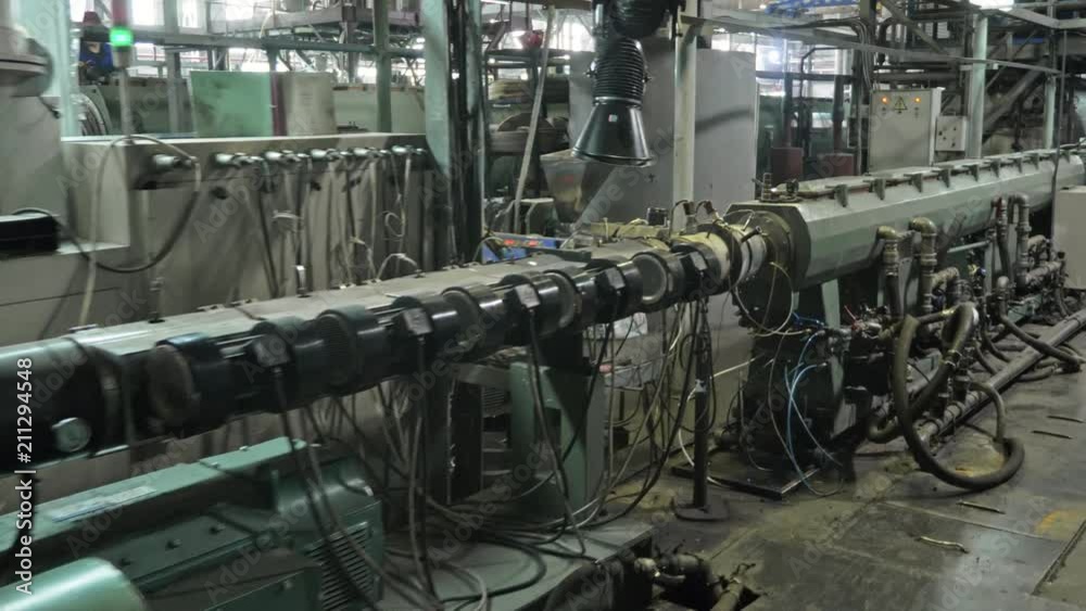 Pipes manufacturing production line. Manufacture of plastic water pipes ...