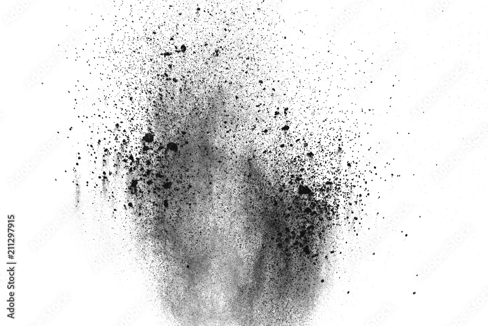 Black powder explosion against white background.Closeup of black dust ...