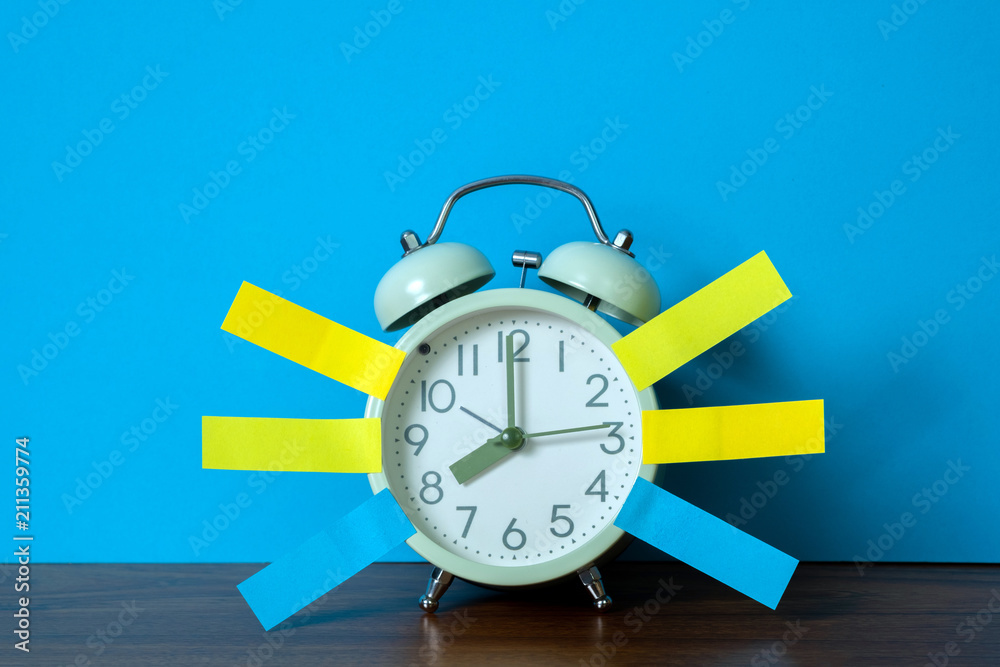 Post it note paper sticky and vintage alarm clock on table with copy ...