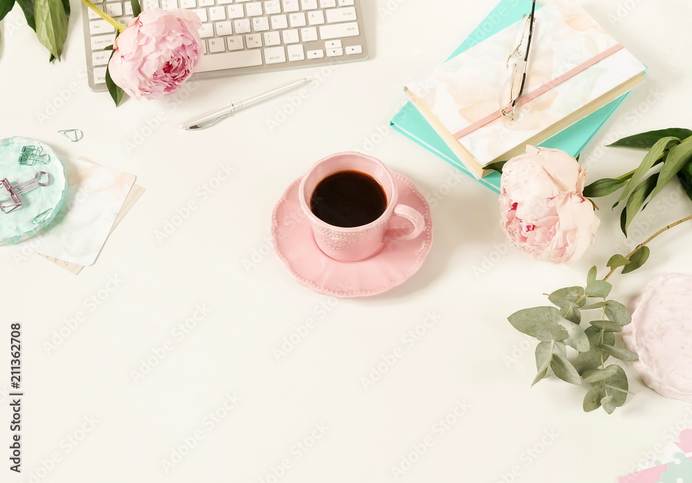 Flat lay women's office desk. Female workspace with laptop, flowers ...