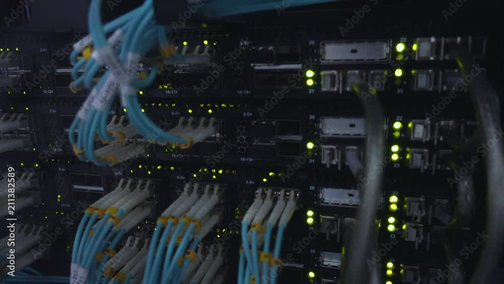 4K. Optical server working dark data servers. Blinking led green lamps ...