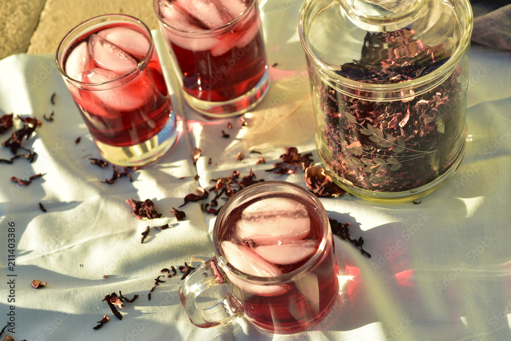 dark red Hibiscus flower petal tea with ice aka Fleur de Jamaica in ...