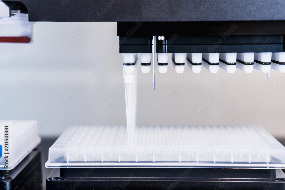 Automation in the clinical laboratory. Pipetting robot laboratory ...