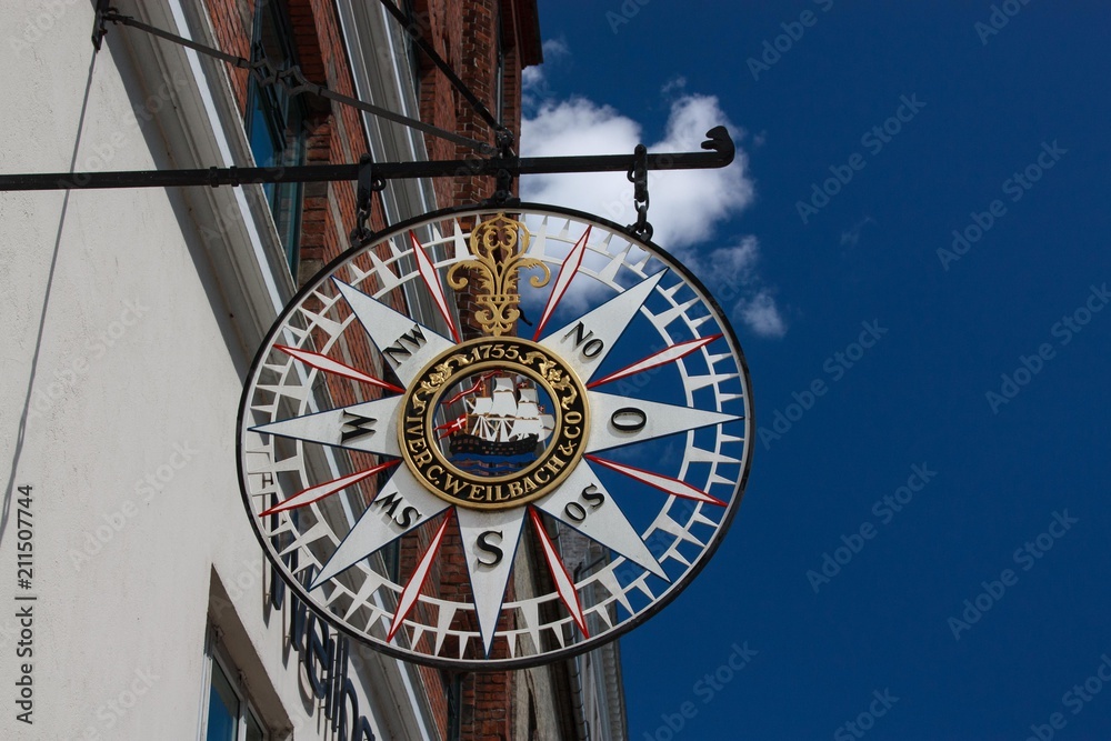 Denmark. Copenhagen. Mariner's compass sign with bright blue sky ...