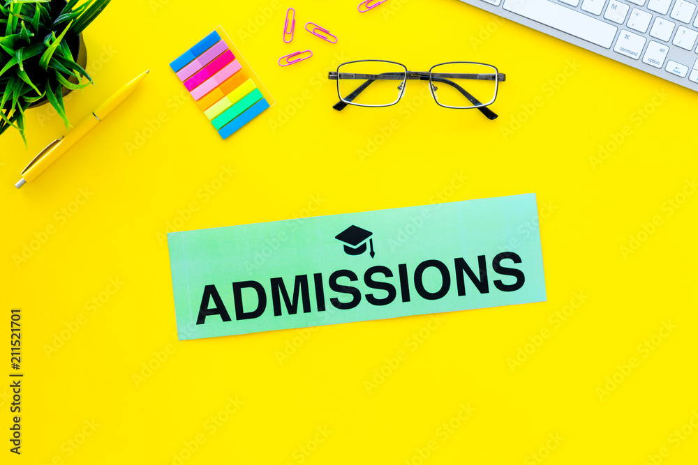 College admission concept. Word admissions with graduation cap sign on ...