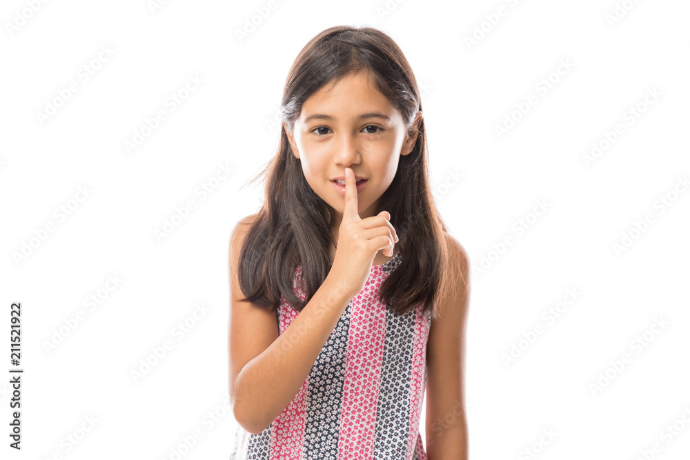 Girl placing finger on lips asking shh, quiet, silence on white ...