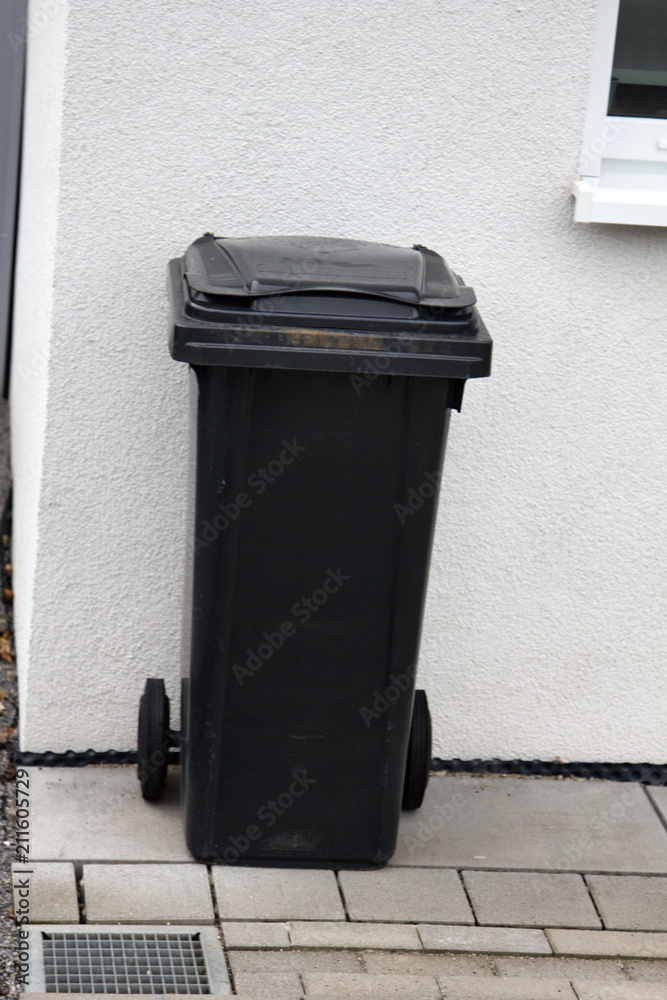 Waste containers and container sites Stock Photo | Adobe Stock