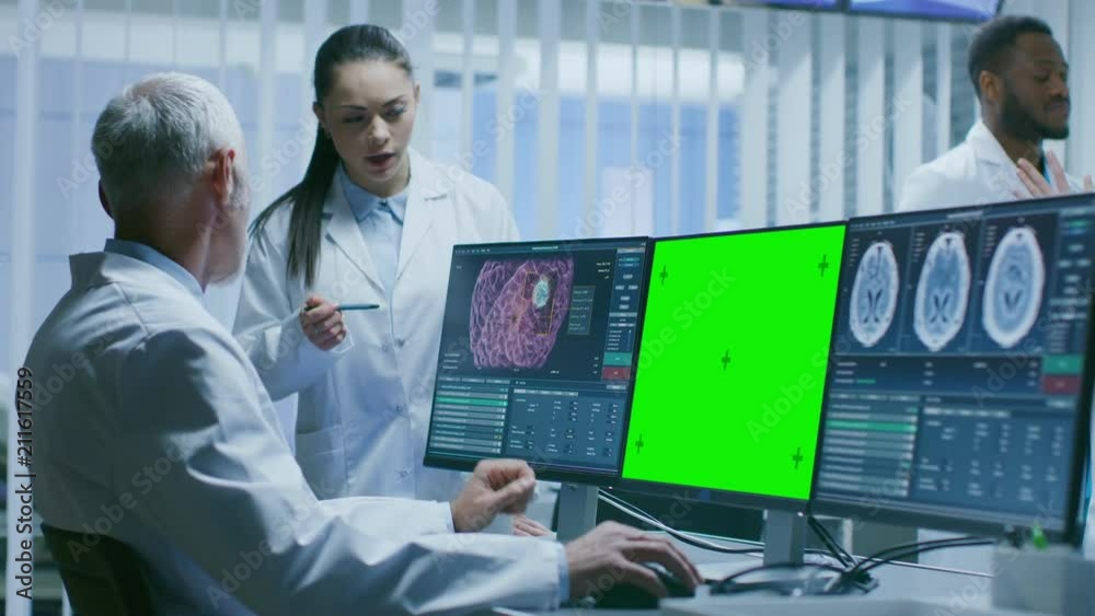 Two Medical Scientists in the Brain Research Laboratory Using Personal ...