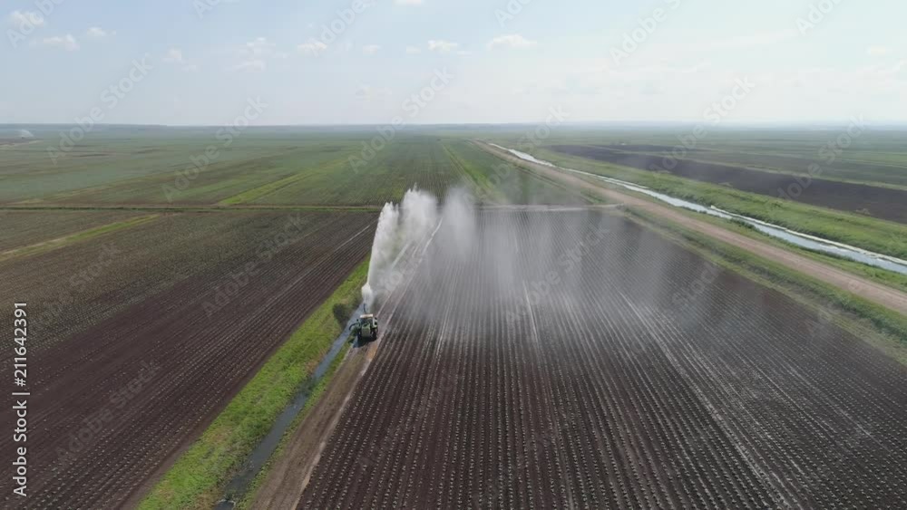 Aerial view of Crop Irrigation using the center pivot sprinkler system ...