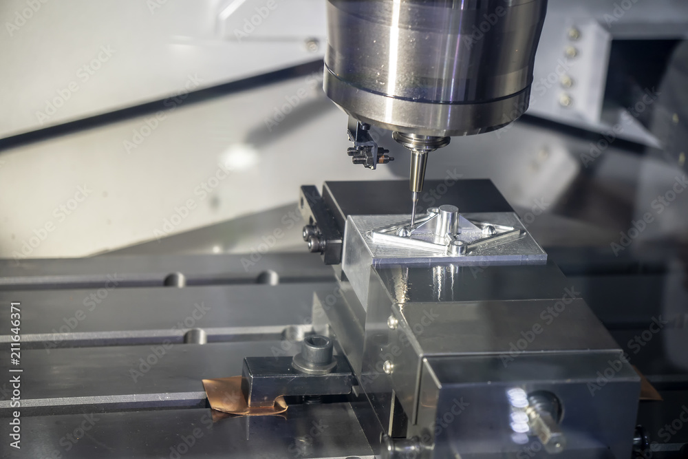 The CNC milling machine cutting the injection mold part with the solid ...