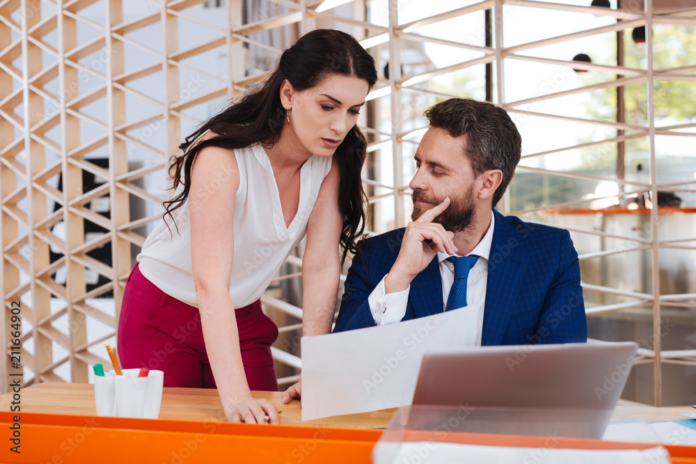 Sexual harassment. Excited bearded man looking lustfully while working ...