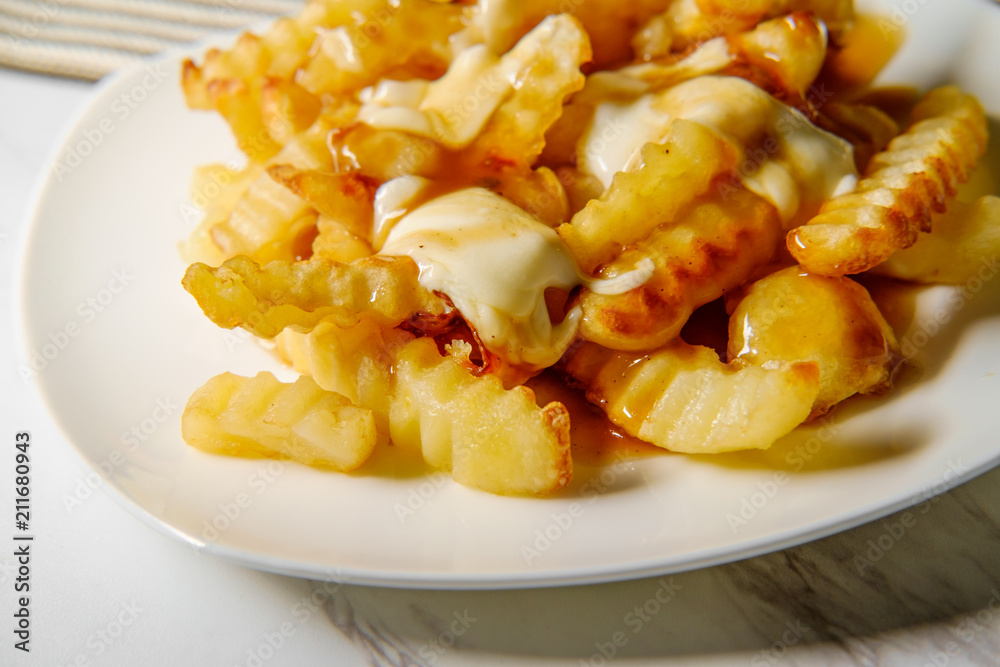 Canadian Poutine Fries Stock Photo | Adobe Stock
