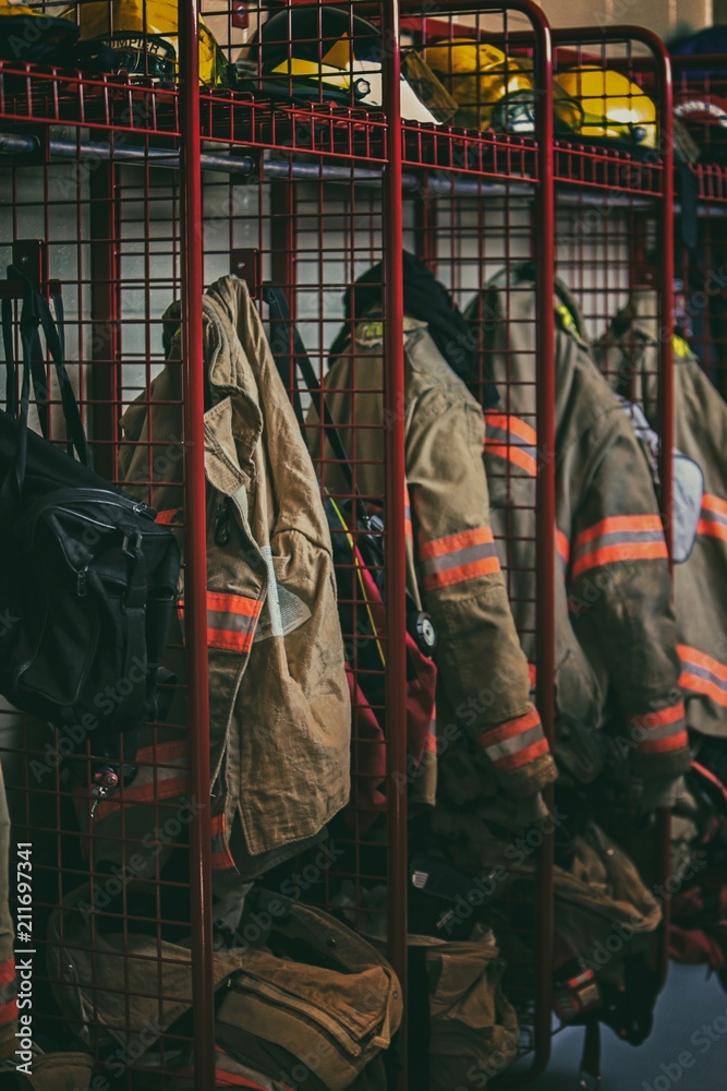 Firemen gear on firefighter truck in the fire station Stock Photo ...