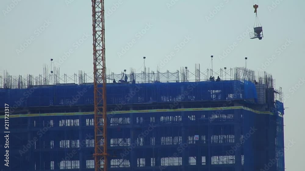 Nha Trang, Vietnam, Asia, July 2 2018. High rise tower crane bucket ...