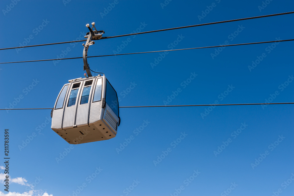 cableway against the sky, transport at height and tourist attraction ...