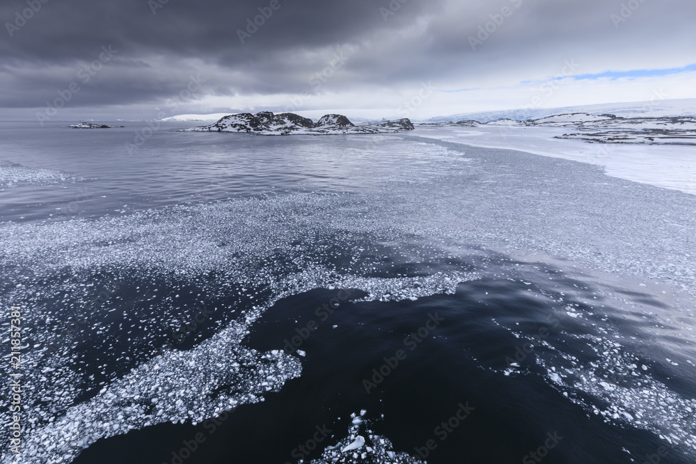 Brash ice and grease ice, Torgersen Island and glaciers of Anvers ...