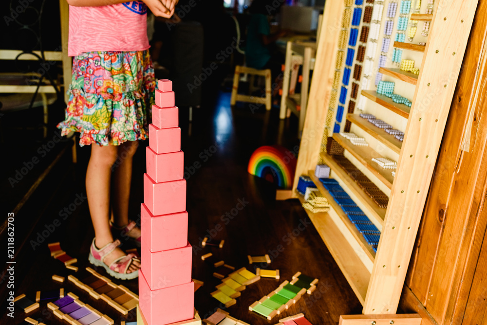 Children playing with pink tower in a Montessori class Stock Photo ...