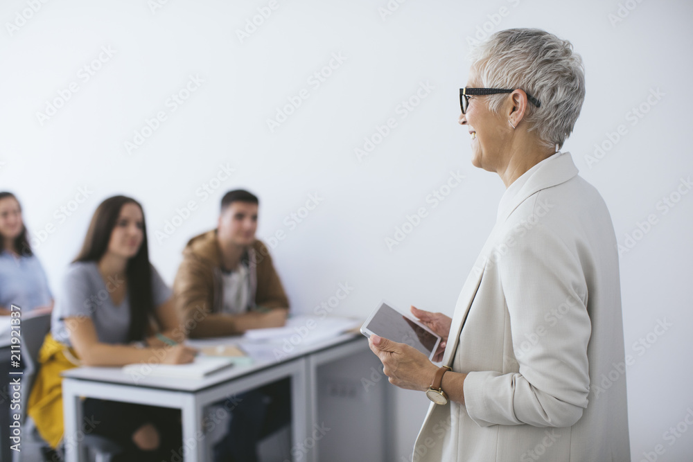 Teacher Teaching a Lesson Stock Photo | Adobe Stock